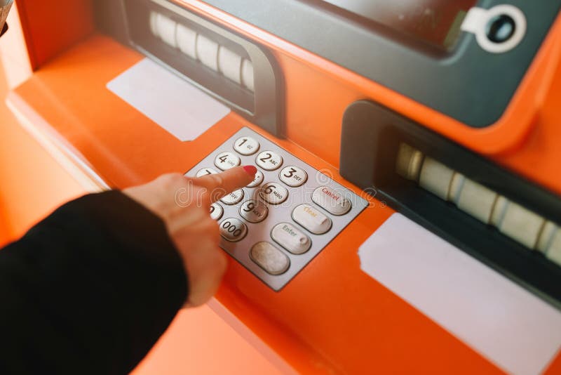 Woman entering pin code stock image. Image of income - 87224973