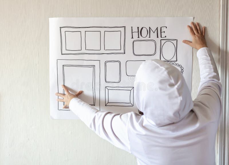 Woman Sizing Up White Poster with Drawn Set of Different Empty Vertical ...