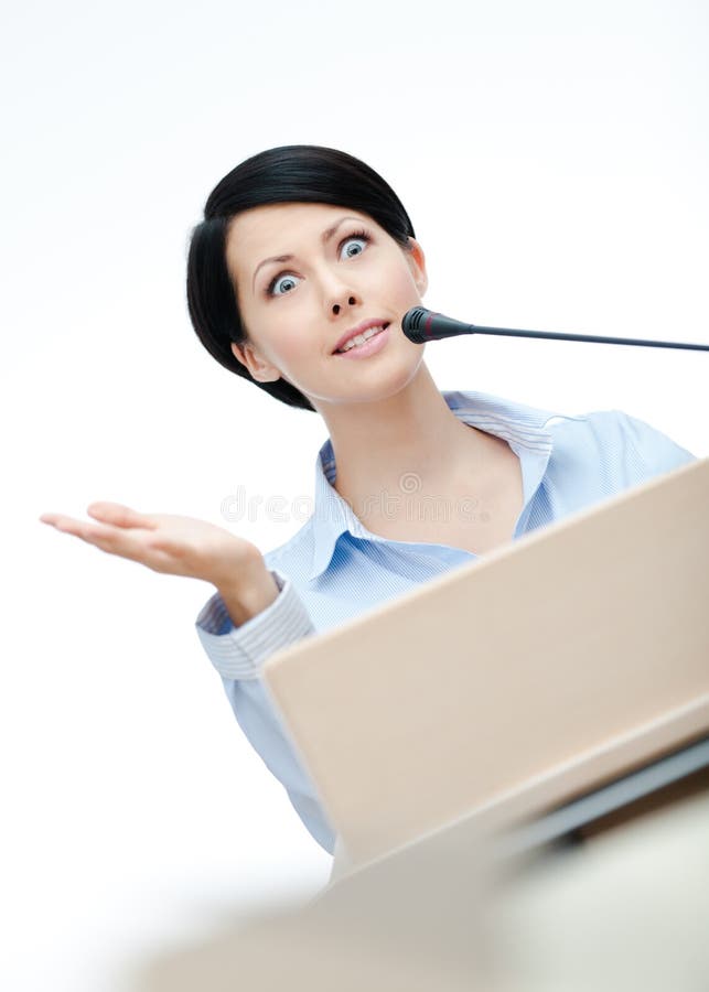 Woman orator at the podium stock image. Image of color - 26630813