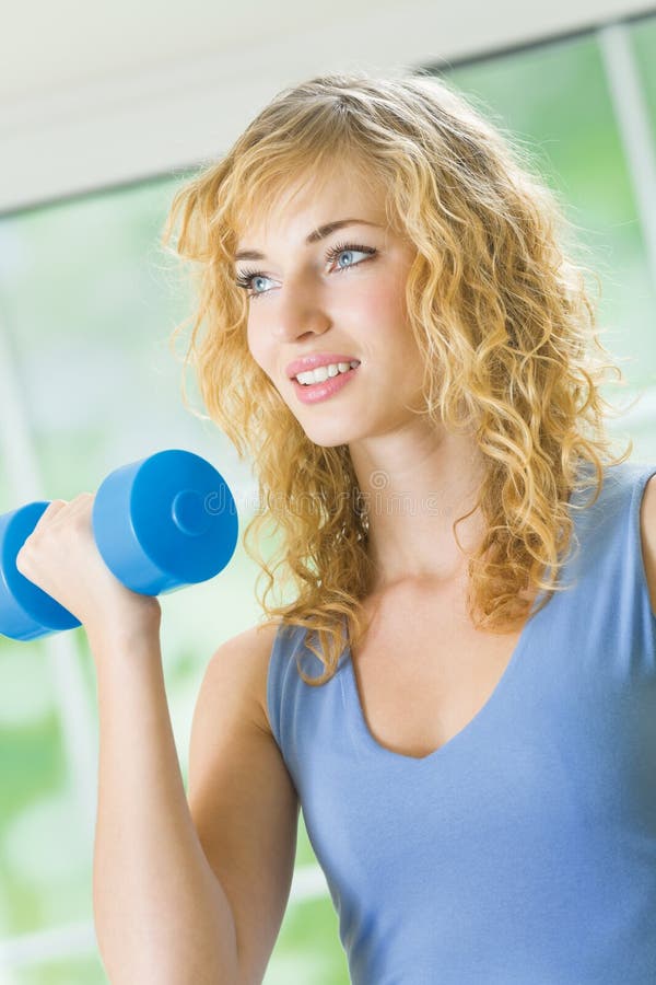 Woman exercising stock photo. Image of girl, blue, home - 11073588