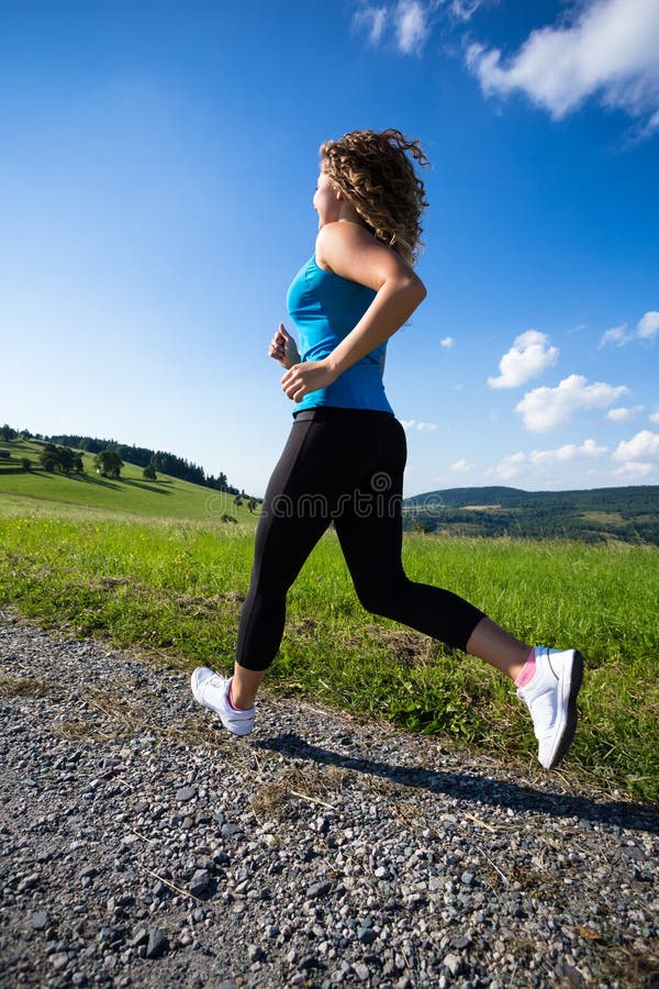 Woman exercising stock photo. Image of grass, country - 60284562