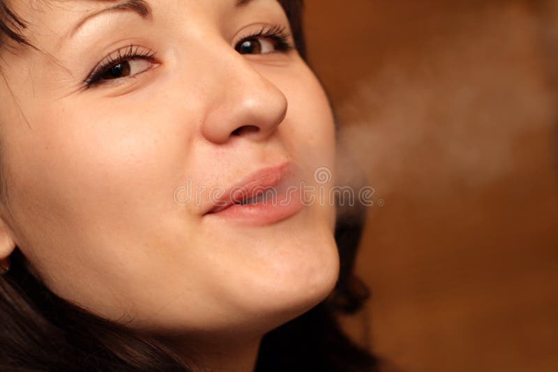 Woman exhaling smoke stock image. Image of portrait, smoking - 5322919