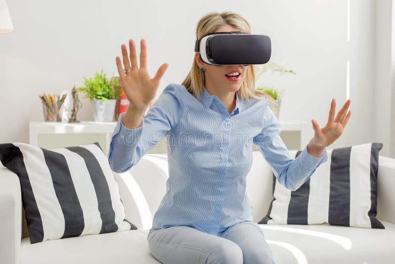 Woman Experiencing Virtual Reality Stock Image - Image of room, adult ...