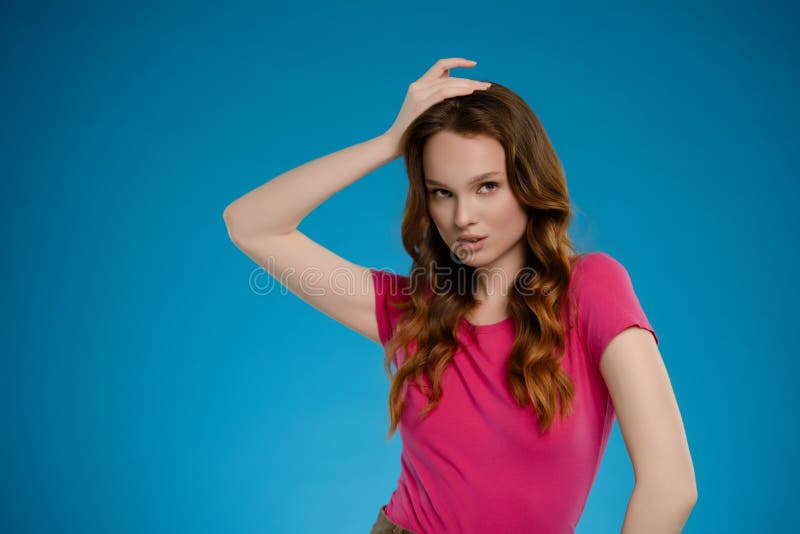 Woman Expressing Confidence and Emotion while Posing in a Studio ...
