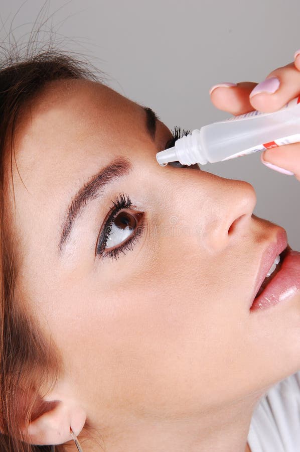 Woman Using Eye Drop stock image. Image of applying, infection - 74155519