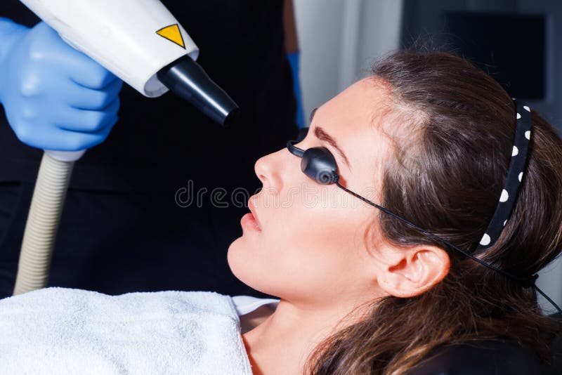 Woman face laser treatment stock image. Image of professional - 81488689