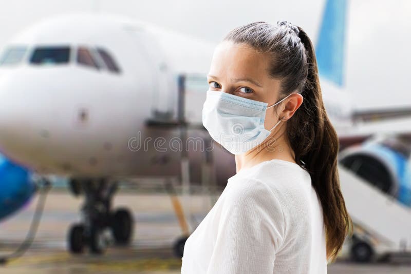 Woman in Face Mask before Boarding Plane Stock Photo - Image of mask ...