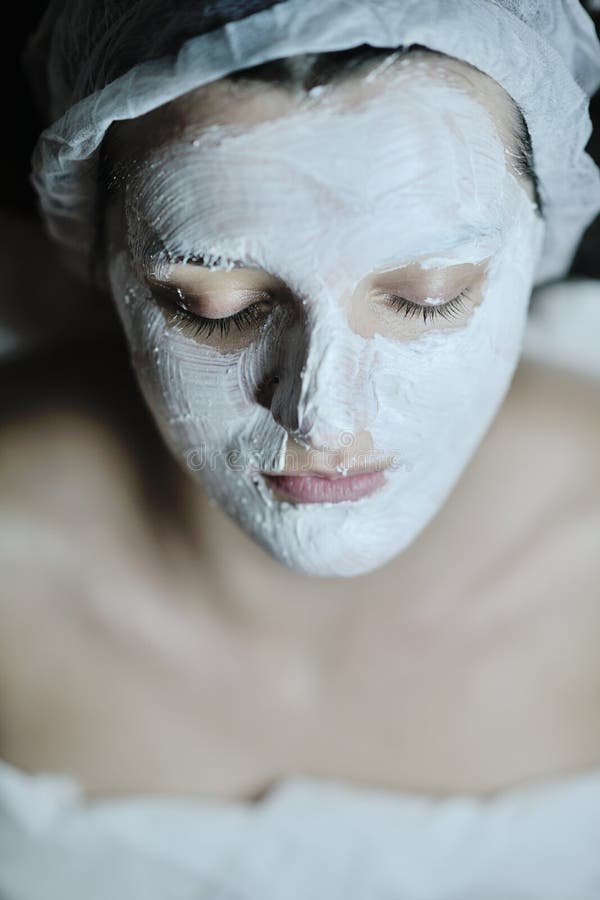 Woman With Facial Mask In Cosmetic Studio Stock Photo - Image of ...