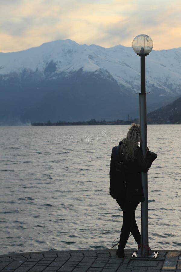 Woman facing the sunset stock image. Image of europe - 21794721