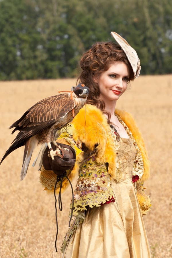 The Woman with Falcon Has a Rest Stock Photo - Image of golden, rural ...