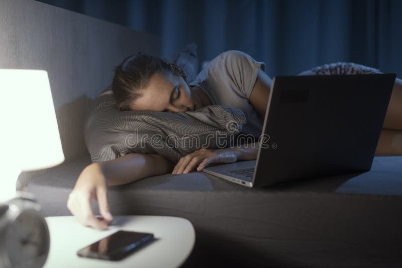 Woman Falling Asleep in Front of Her Laptop in Bed Stock Photo - Image of insomnia, overworked ...