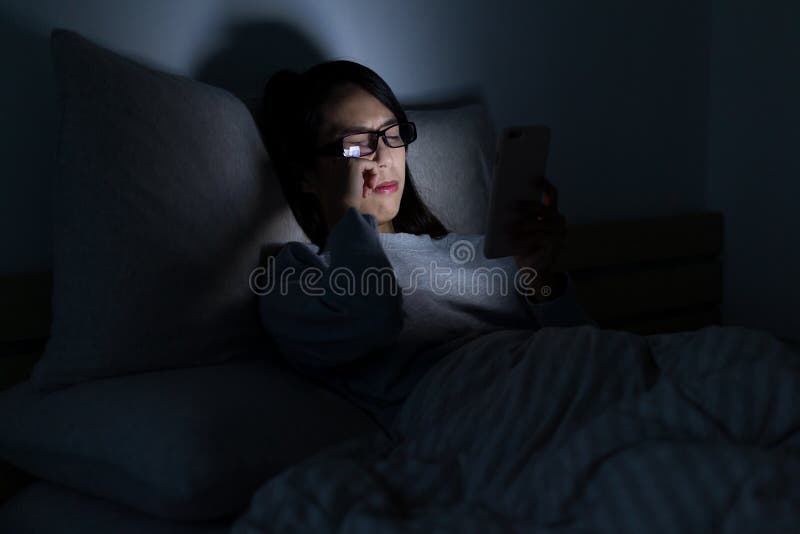 Woman Feeling Tired when Using Mobile Phone at Night Stock Photo ...