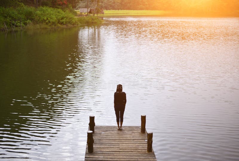 Woman Feeling Victorious Facing on the Bridge in the Lake Stock Photo ...