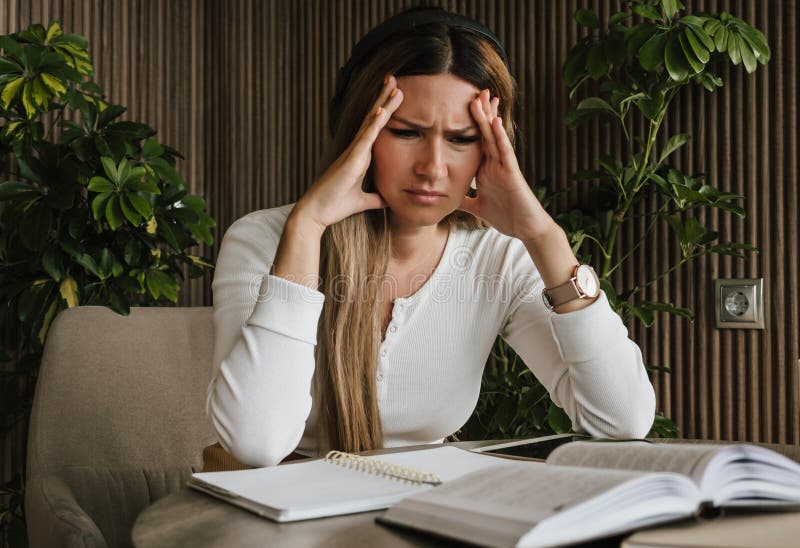 Woman Feels Work Stress, Holding Head in Frustration while Surrounded ...
