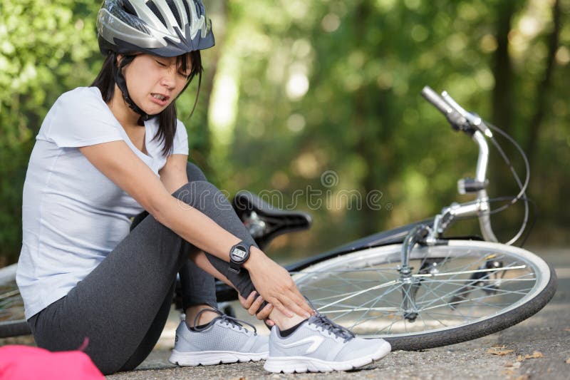 Woman fell off bike stock image. Image of sportswear - 302705593