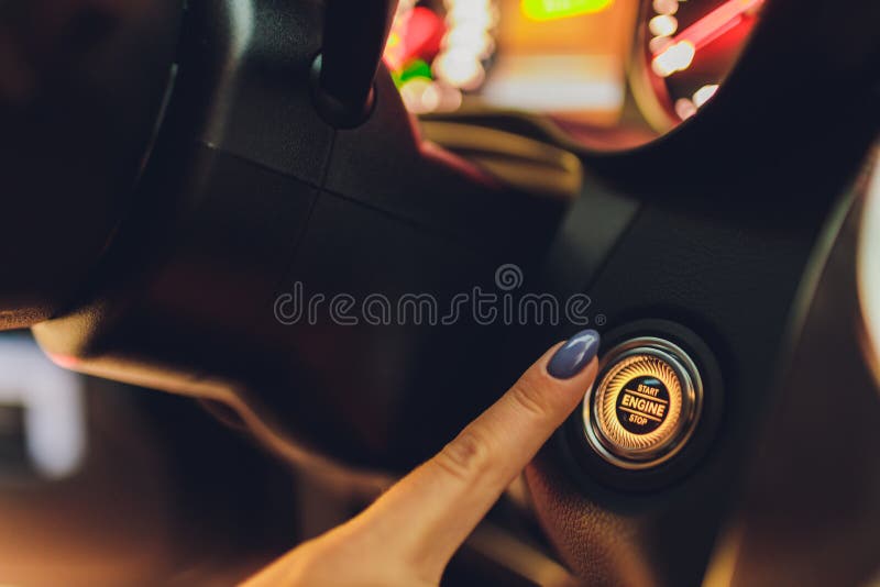Woman Female Finger Pressing the Engine Start Stop Button of a Car ...