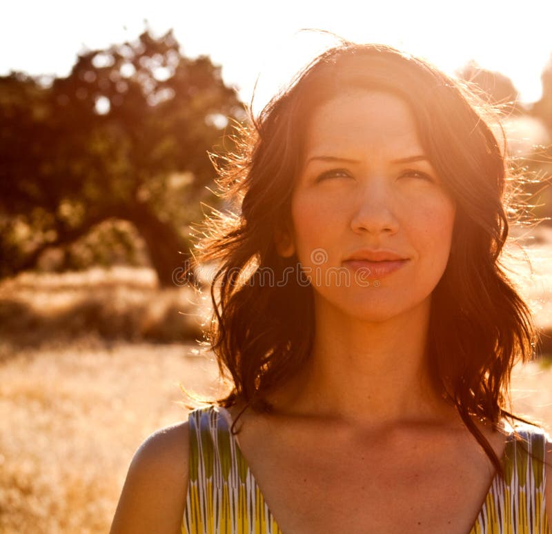 Woman in Field with Bright Sun Light Stock Photo - Image of horizontal ...