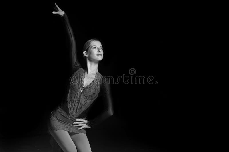 Woman Figure Skater Posing on Dark Background Stock Image - Image of ...