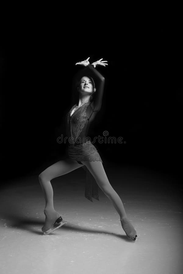 Woman Figure Skater Posing on Dark Background Stock Photo - Image of ...