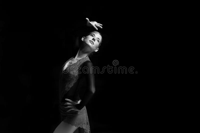 Woman Figure Skater Posing on Dark Background Stock Photo - Image of ...