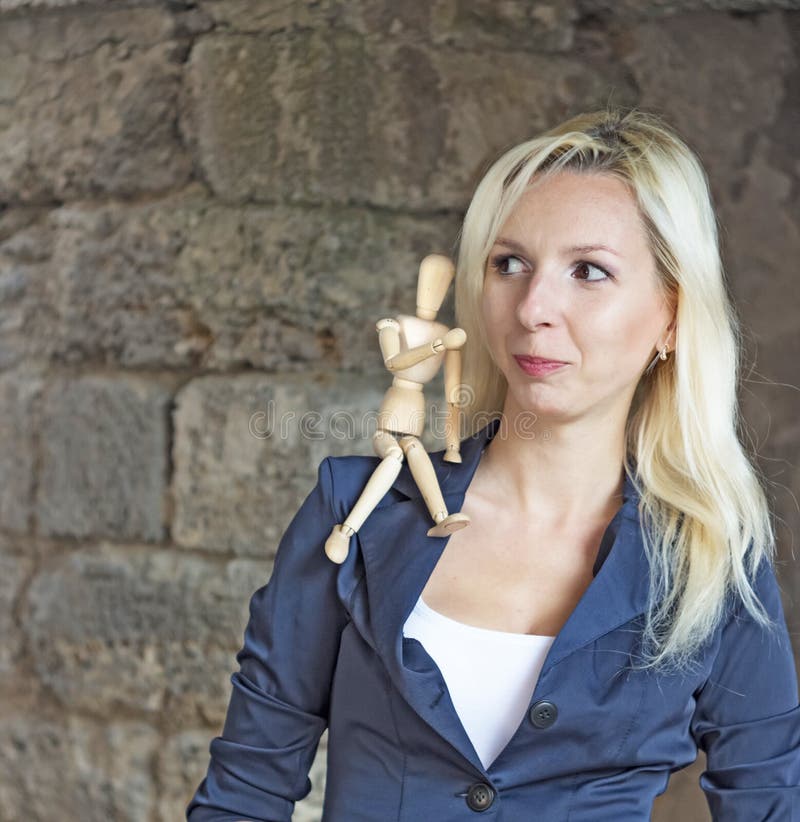 Woman with figurine stock photo. Image of beautiful, subject - 26547806