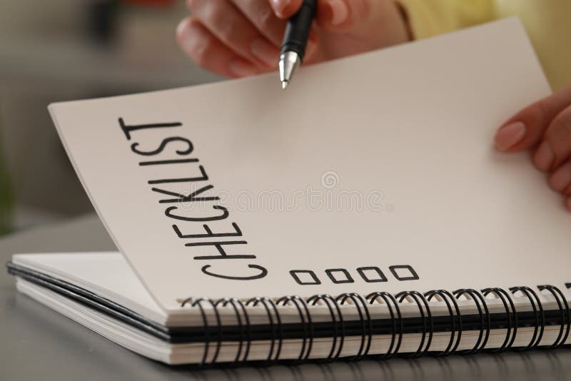 Woman Filling Checklist at Grey Table, Closeup Stock Image - Image of ...