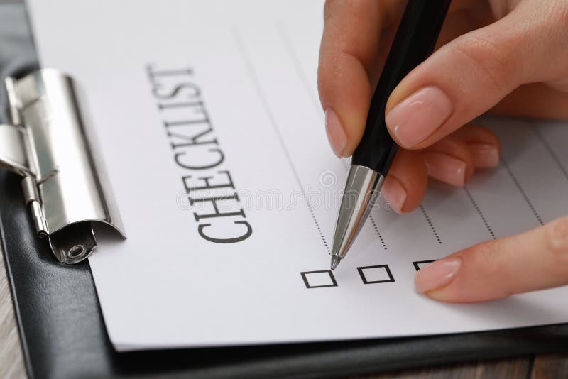 Woman Filling Checklist at Table, Closeup View Stock Image - Image of ...