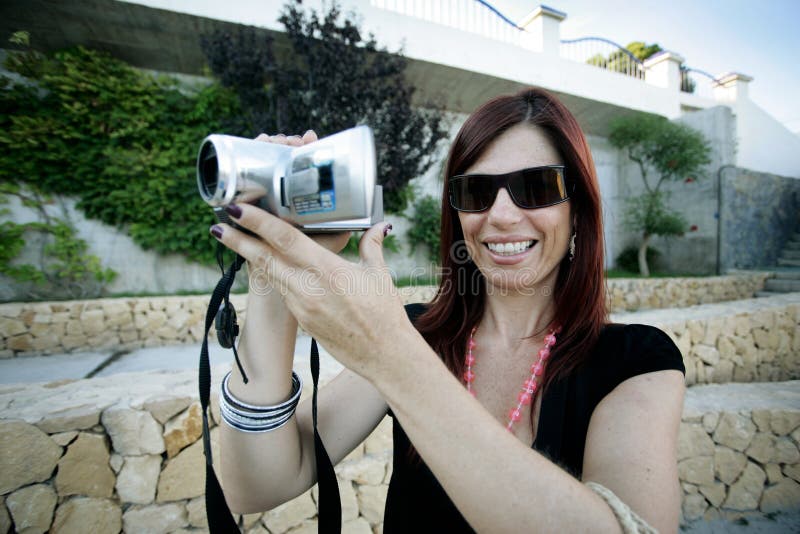 Woman Filming and Using a Video Camera Stock Photo - Image of daytime ...