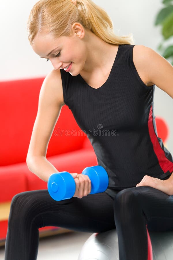 Woman fitness at home stock photo. Image of dumbbells - 5314890