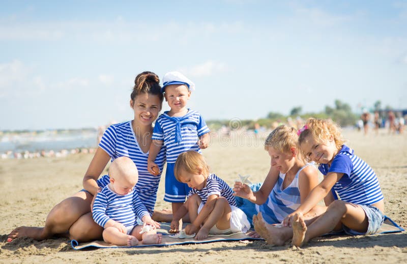 Woman with five children stock image. Image of happy - 76354943