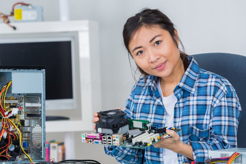 Woman Fixing Computer at Work Stock Photo - Image of dismantling ...