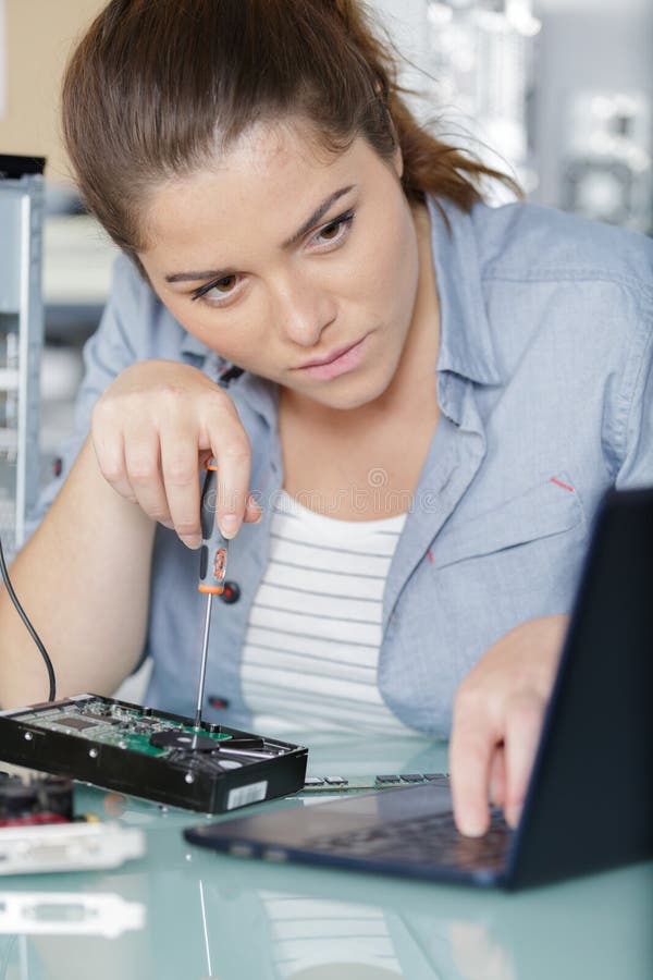 Woman Fixing Desktop Computer Seated Table Stock Photos - Free ...