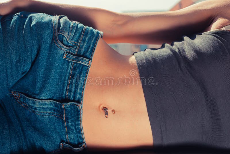 Woman with Tattoo Around Navel Stock Image - Image of belly, button ...