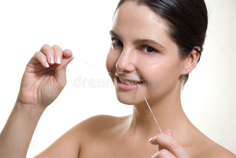Woman flossing stock photo. Image of hygiene, teeth, beauty - 10675884