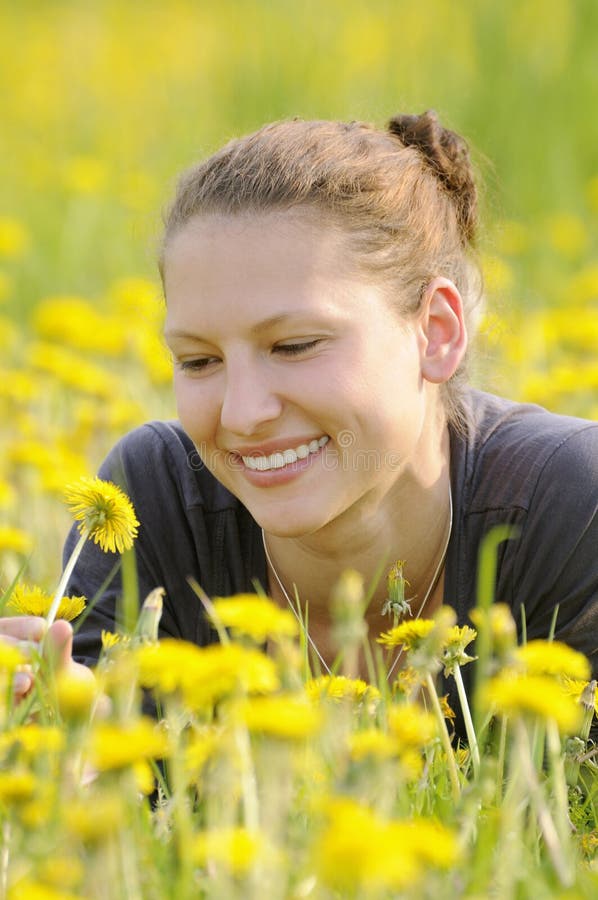 Woman on a flower meadow stock image. Image of beautiful - 19421491