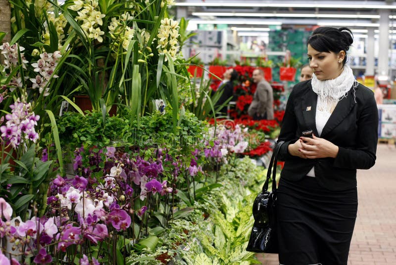 Woman in flower shop editorial photo. Image of botany - 19319446