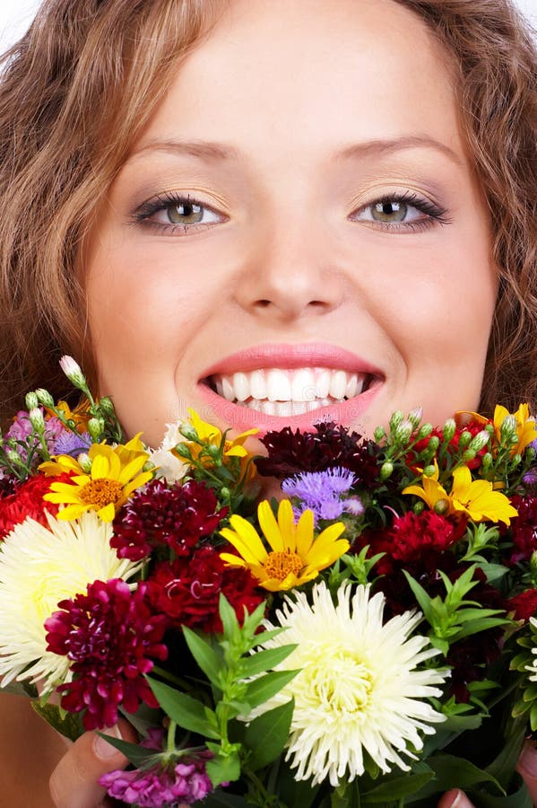 Woman with flowers stock image. Image of attractive, pretty - 4386941