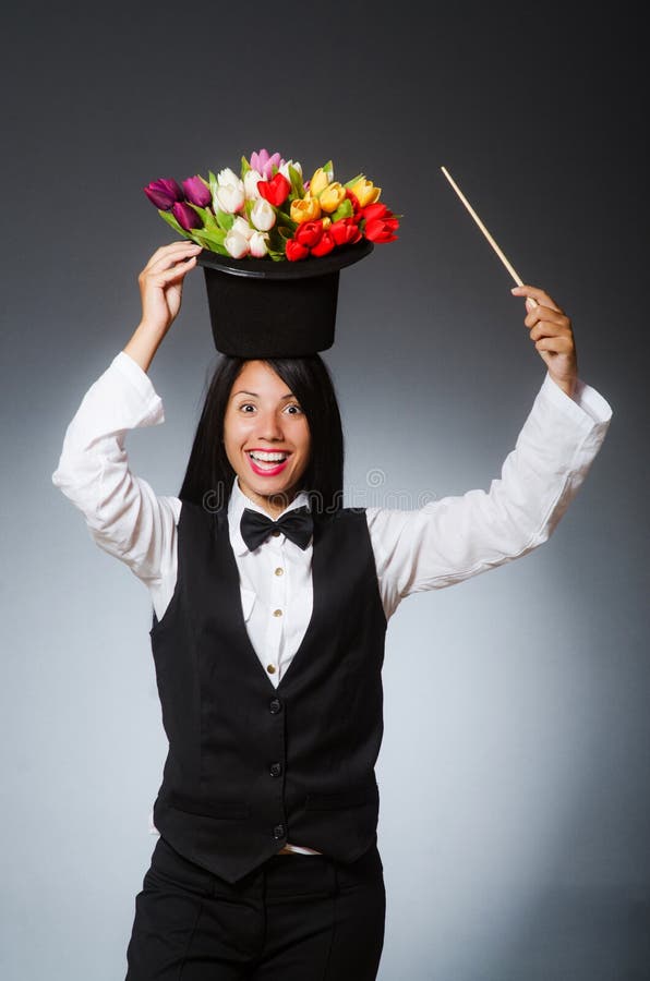 The Woman with Flowers in Hat Stock Image - Image of sorcerer, flowers ...