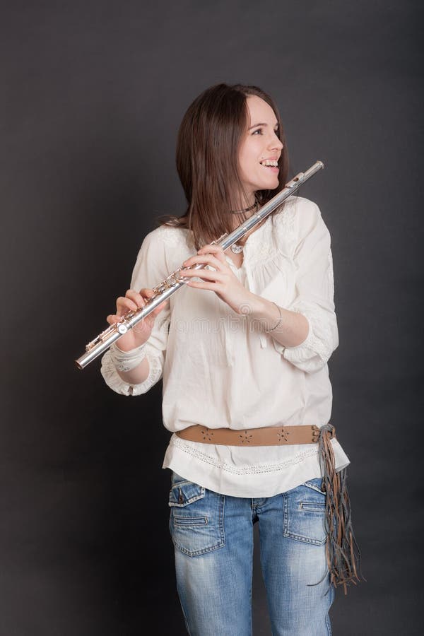 Woman with a flute stock photo. Image of beauty, musical - 242522948