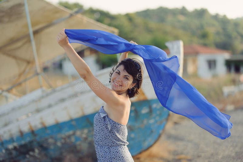 Woman with Flying Scarf stock photo. Image of casual - 42970326