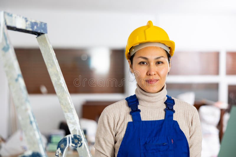 Woman Foreman Checks the Completed Construction Work on Drawing Stock ...