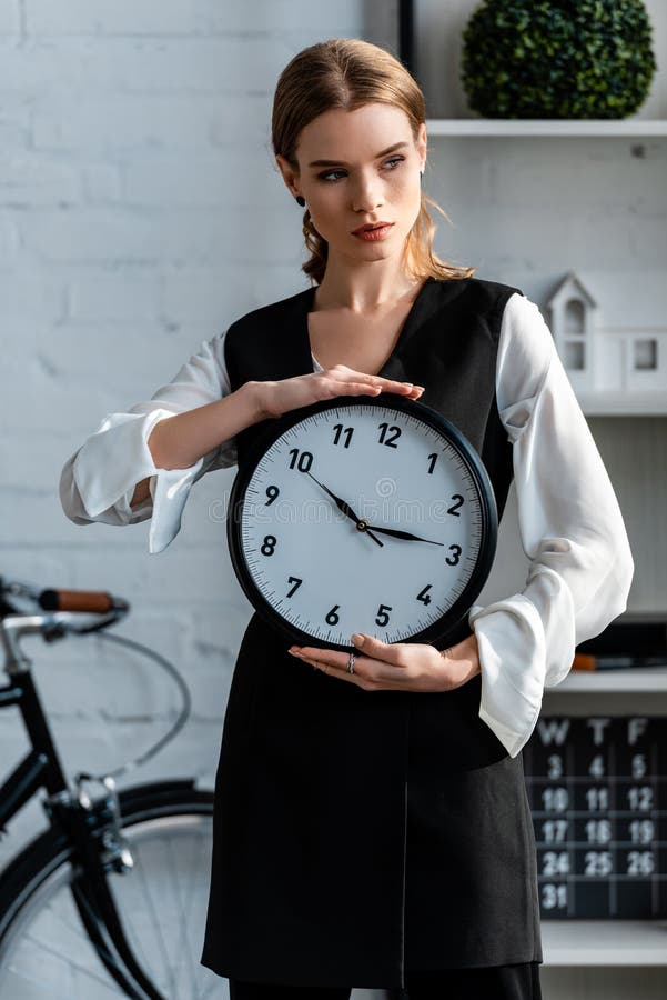 Woman in Formal Wear Holding Clock Stock Photo - Image of people ...