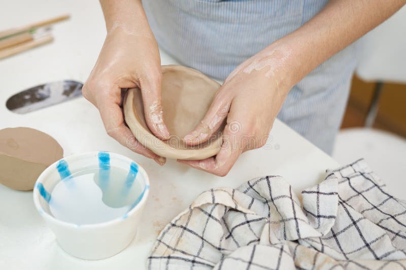 Woman Forming Clay Pot Shape by Hands, Closeup in Artistic Studio Stock ...