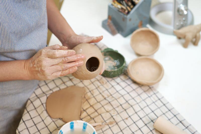 Woman Forming Clay Pot Shape by Hands, Closeup in Artistic Studio Stock ...