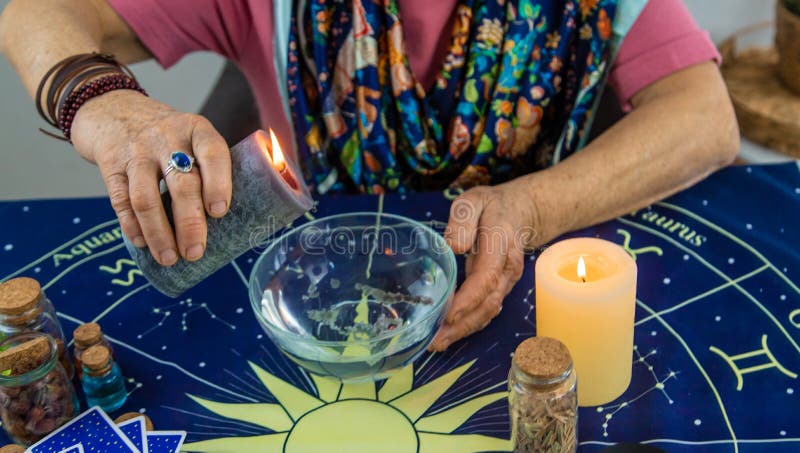 Woman Fortune Teller Fortune Telling Wax Candles. Selective Focus Stock ...