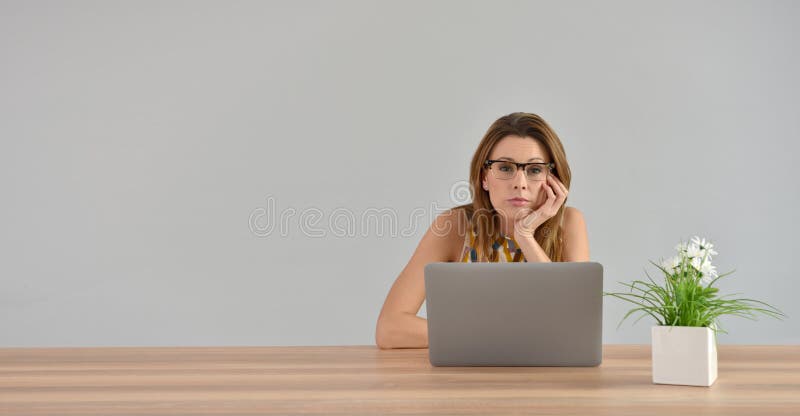 Woman in Front of Laptop Getting Bored Stock Photo - Image of business ...