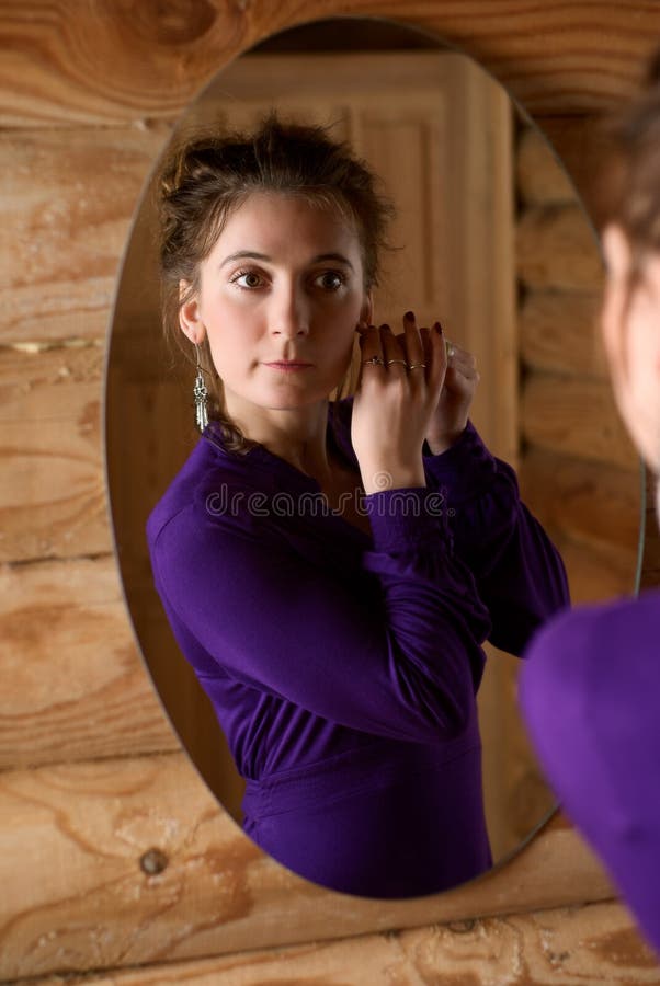 Woman in Front of a Mirror. Stock Image - Image of human, colour: 15022187