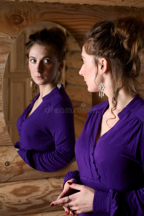 Woman in Front of a Mirror. Stock Image - Image of human, colour: 15022187