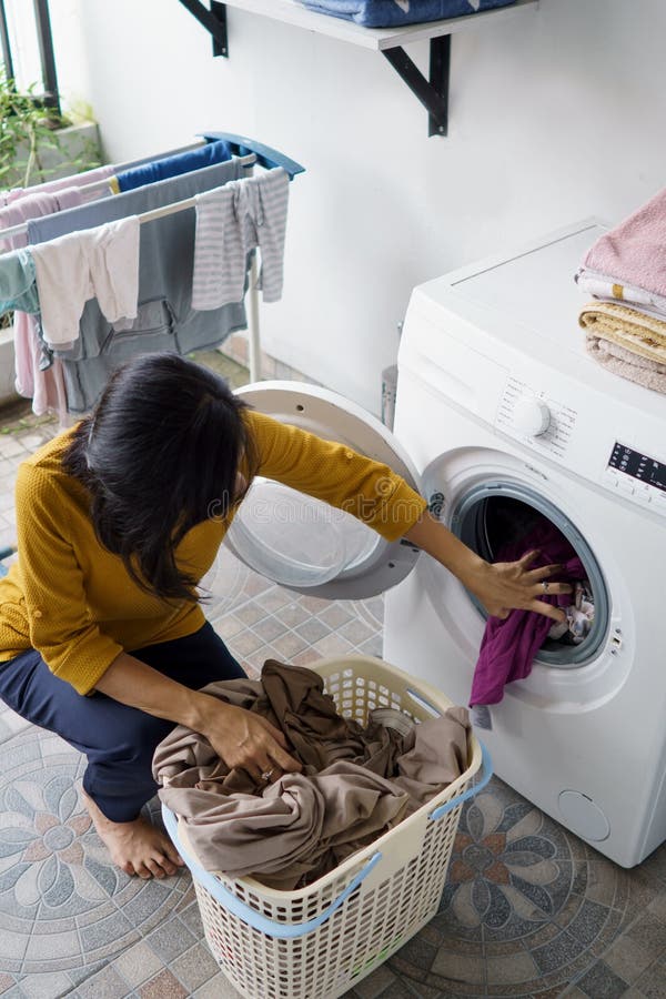 223 Washing Machine Lady Loading Stock Photos - Free & Royalty-Free ...