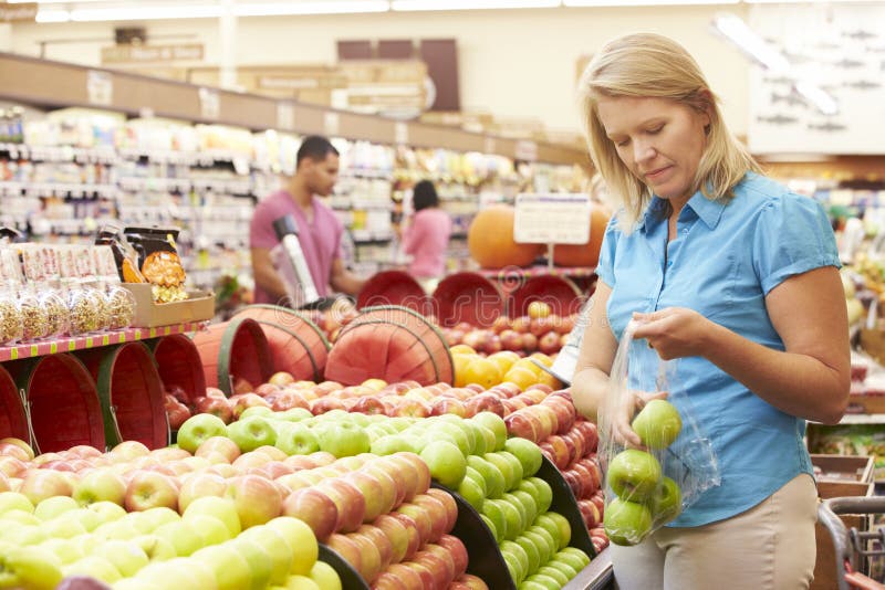 Woman at Fruit Counter in Supermarket Stock Photo - Image of choice ...